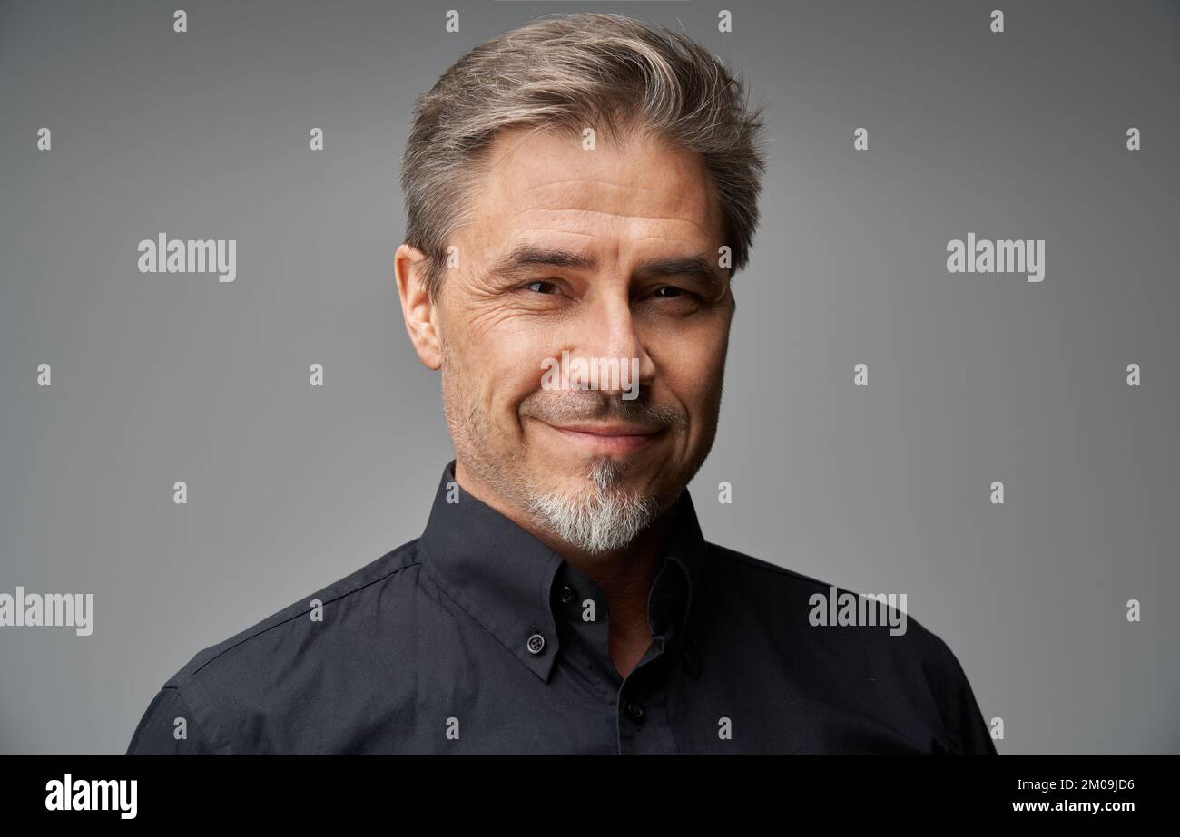 Business portrait - businessman smiling. Mature age, middle age, mid ...