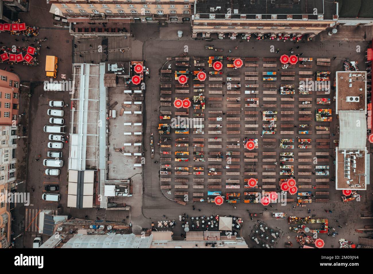 Top down aerial view over the market in the city center and the old ...