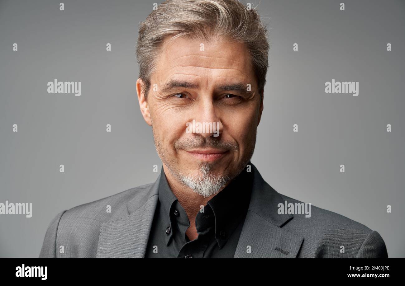 Business portrait - businessman smiling. Mature age, middle age, mid ...