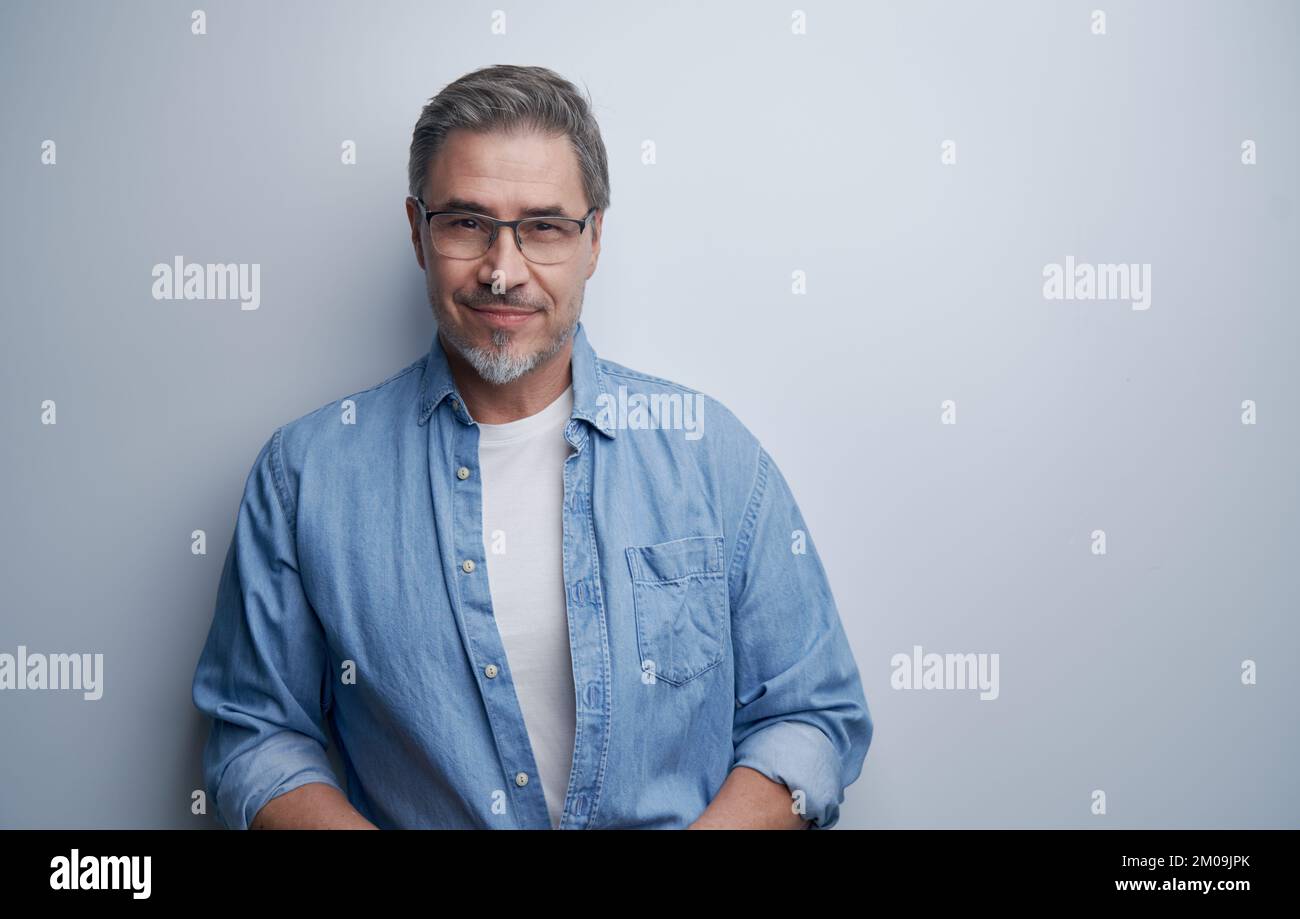 Portrait of mature age, middle age, mid adult casual man in 50s, happy ...