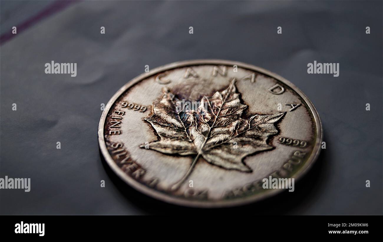 An old canada maple leaf silver coin from the 60s years Stock Photo - Alamy