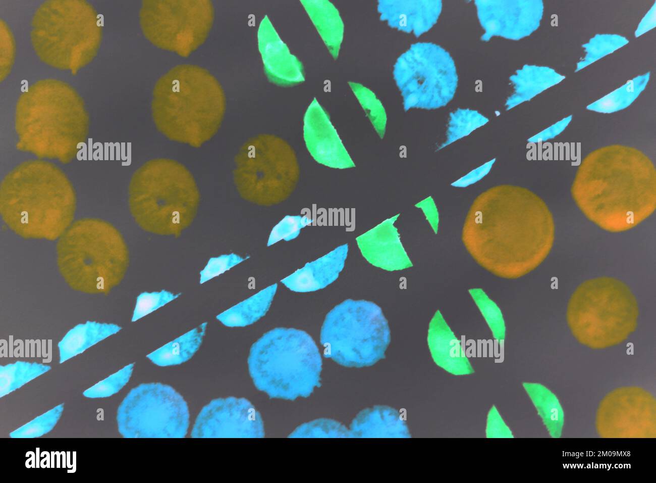 Handmade painted drawing with many circles and dots in a color film ...