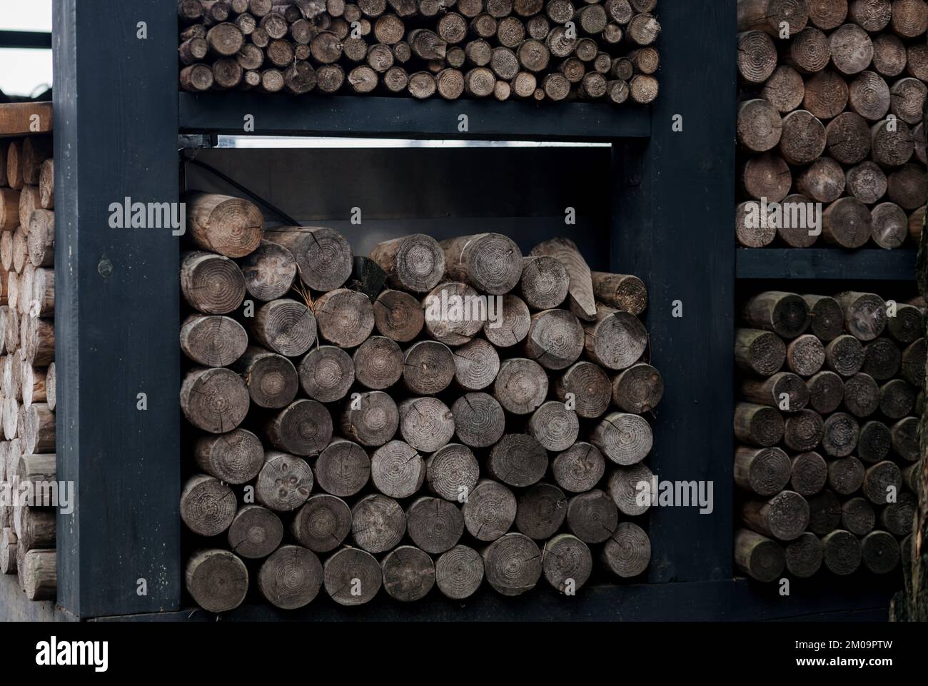 Pile of wood logs storage for industry. wooden stack Stock Photo - Alamy