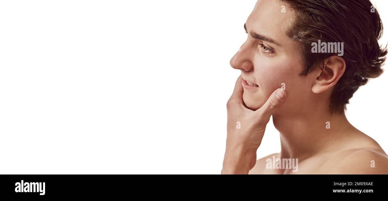 Portrait of young man after shaving isolated over white background. Men ...