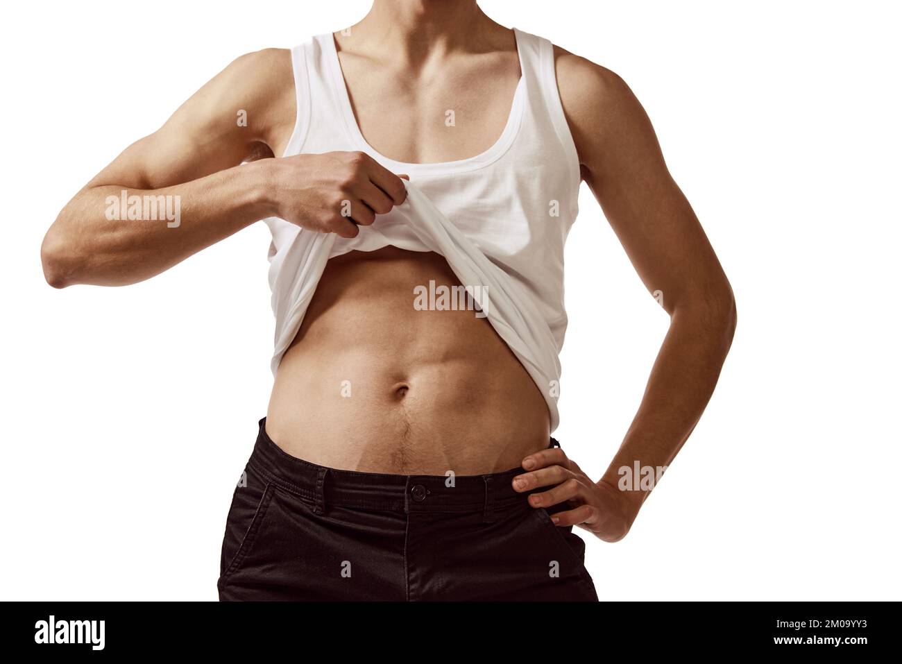Faceless image of young male body, man showing belly muscles isolated ...