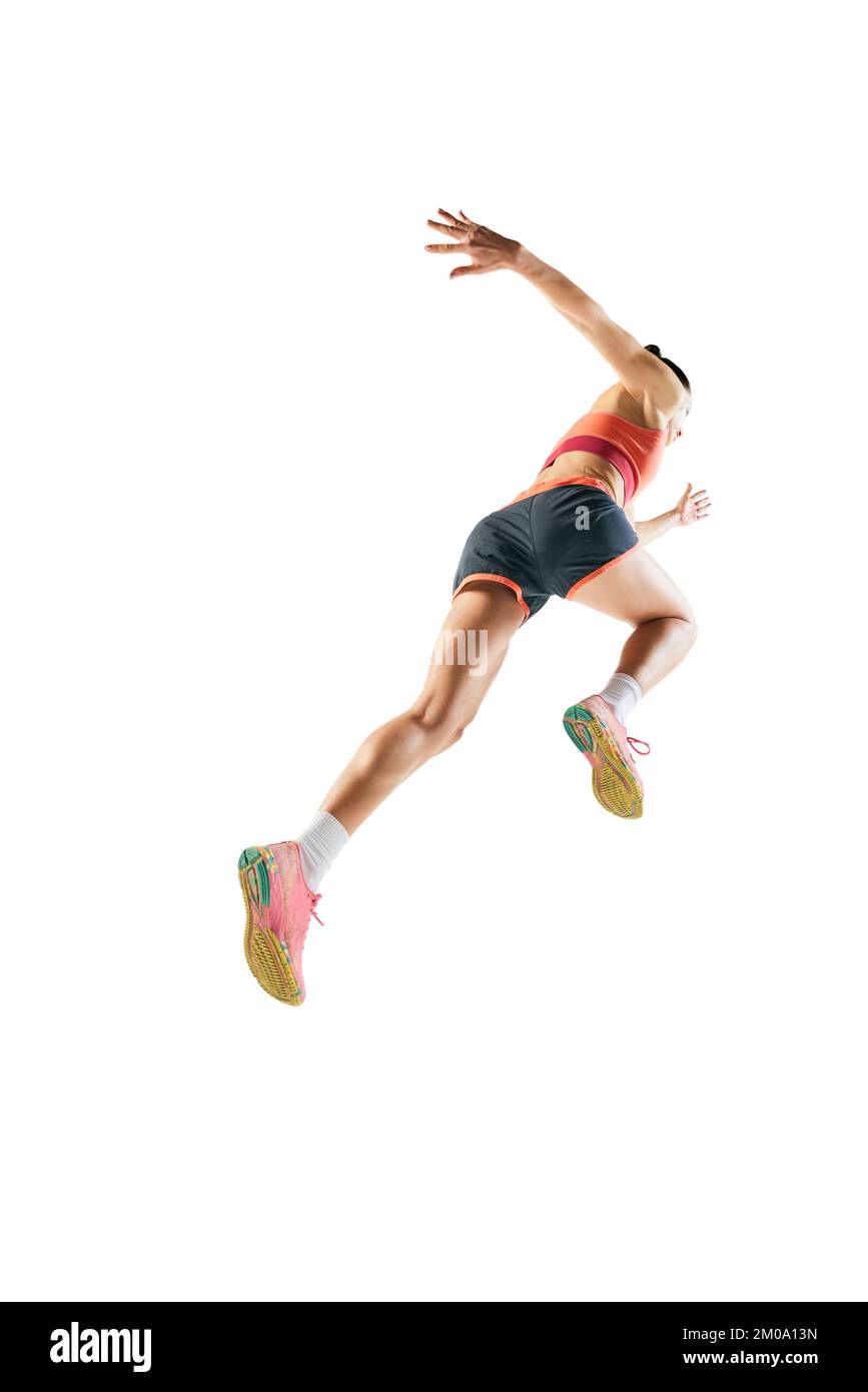 Back view. Sportive muscled woman, professional runner running away ...