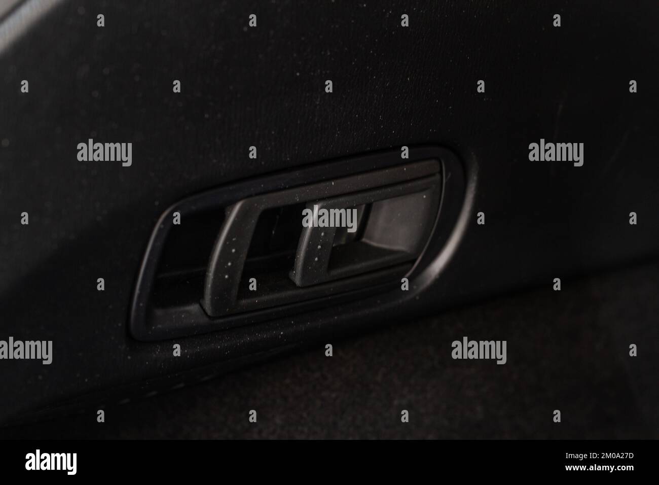 Rear seats wasy fold down lever Stock Photo - Alamy