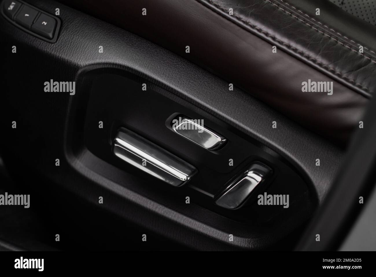 Electric car seat adjustment control panel close up view. Adjustable ...