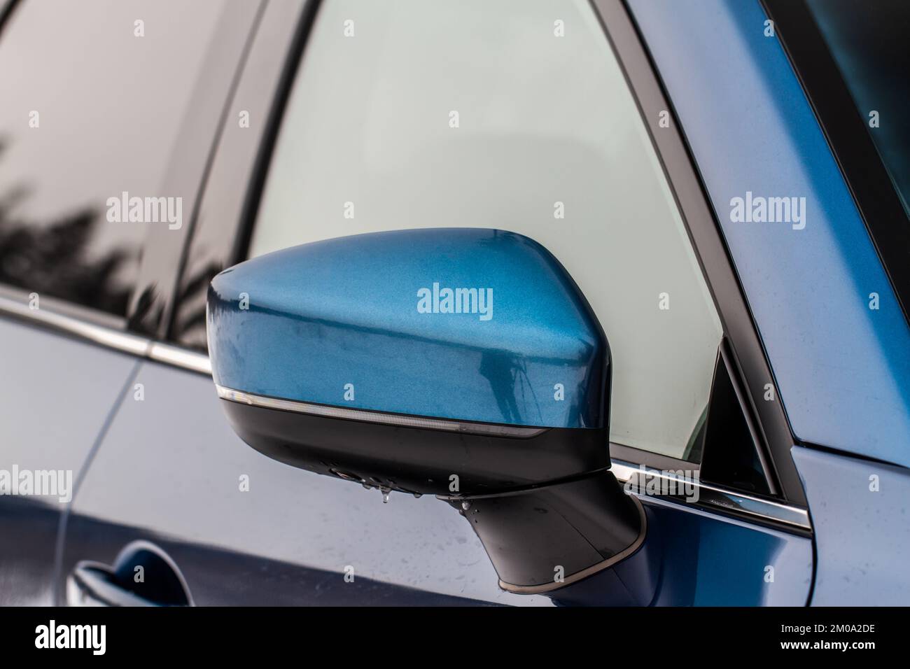 Close up front view of car side mirror. Front rear view mirror on the ...