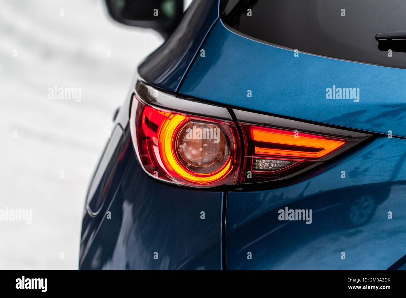 Modern rear light of a car. Brake light and arrow of large suv. Rear ...