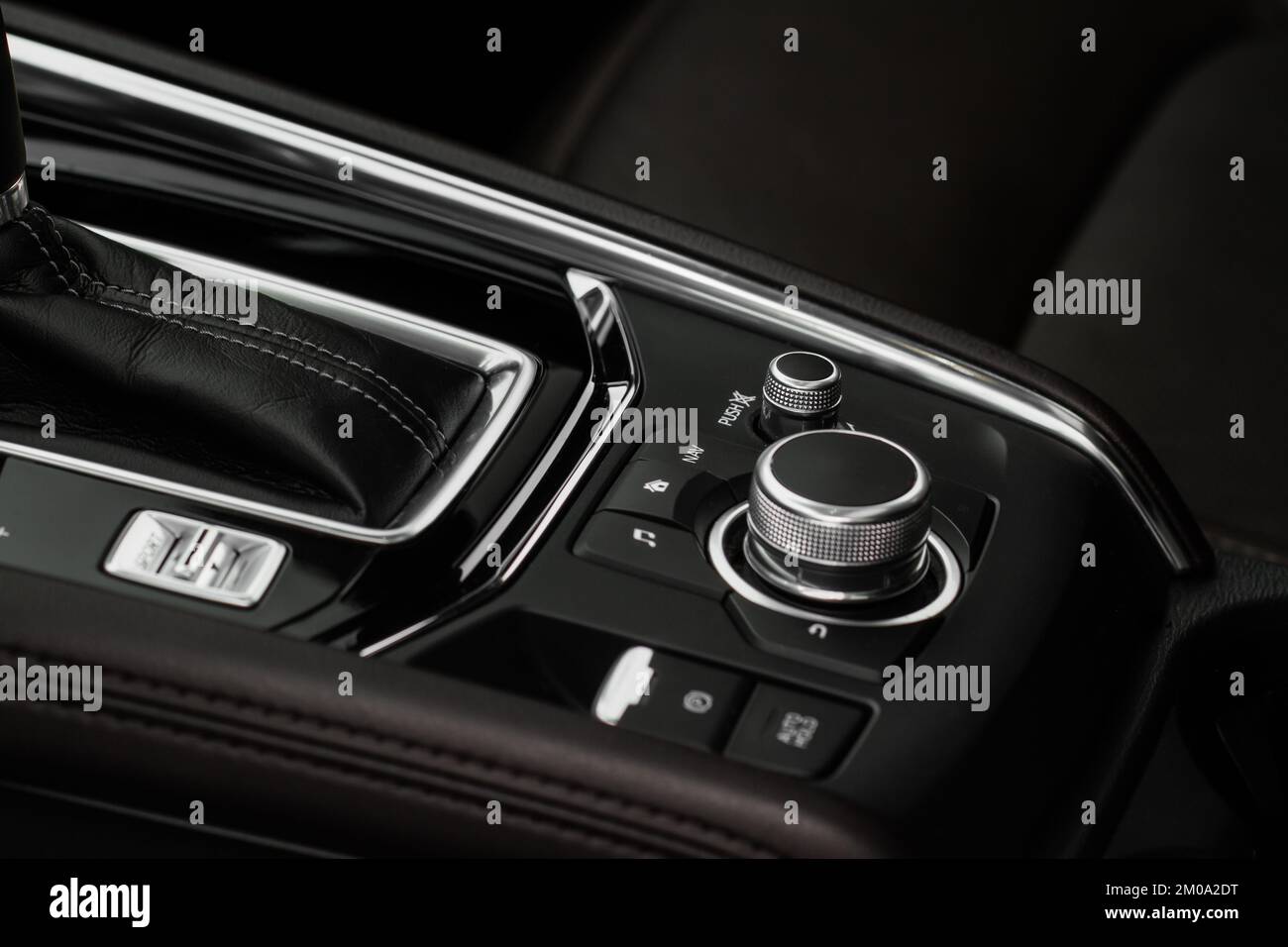Car media controller close up. Modern car media and navigation control ...