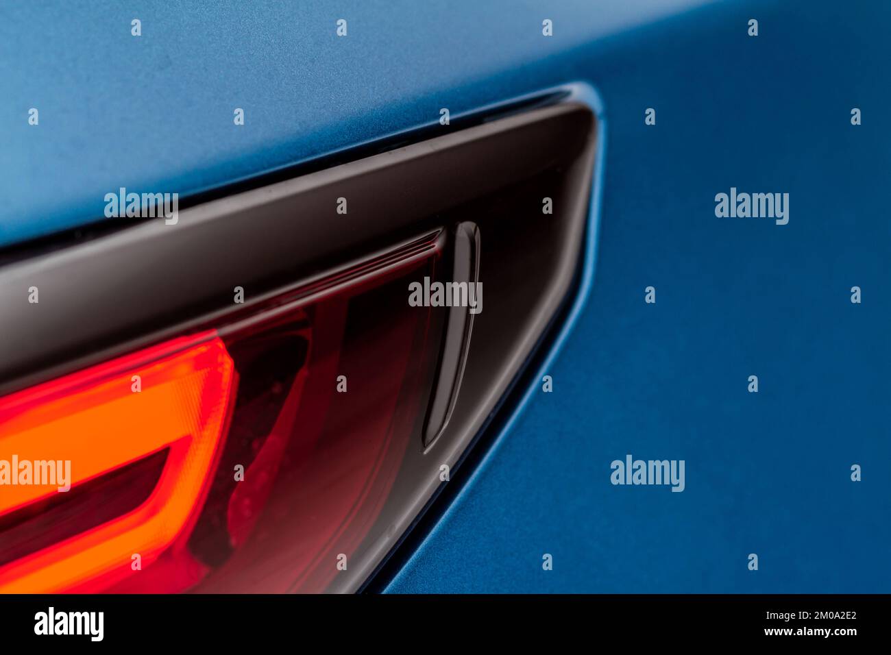 Modern rear light of a car. Brake light and arrow of large suv. Rear ...