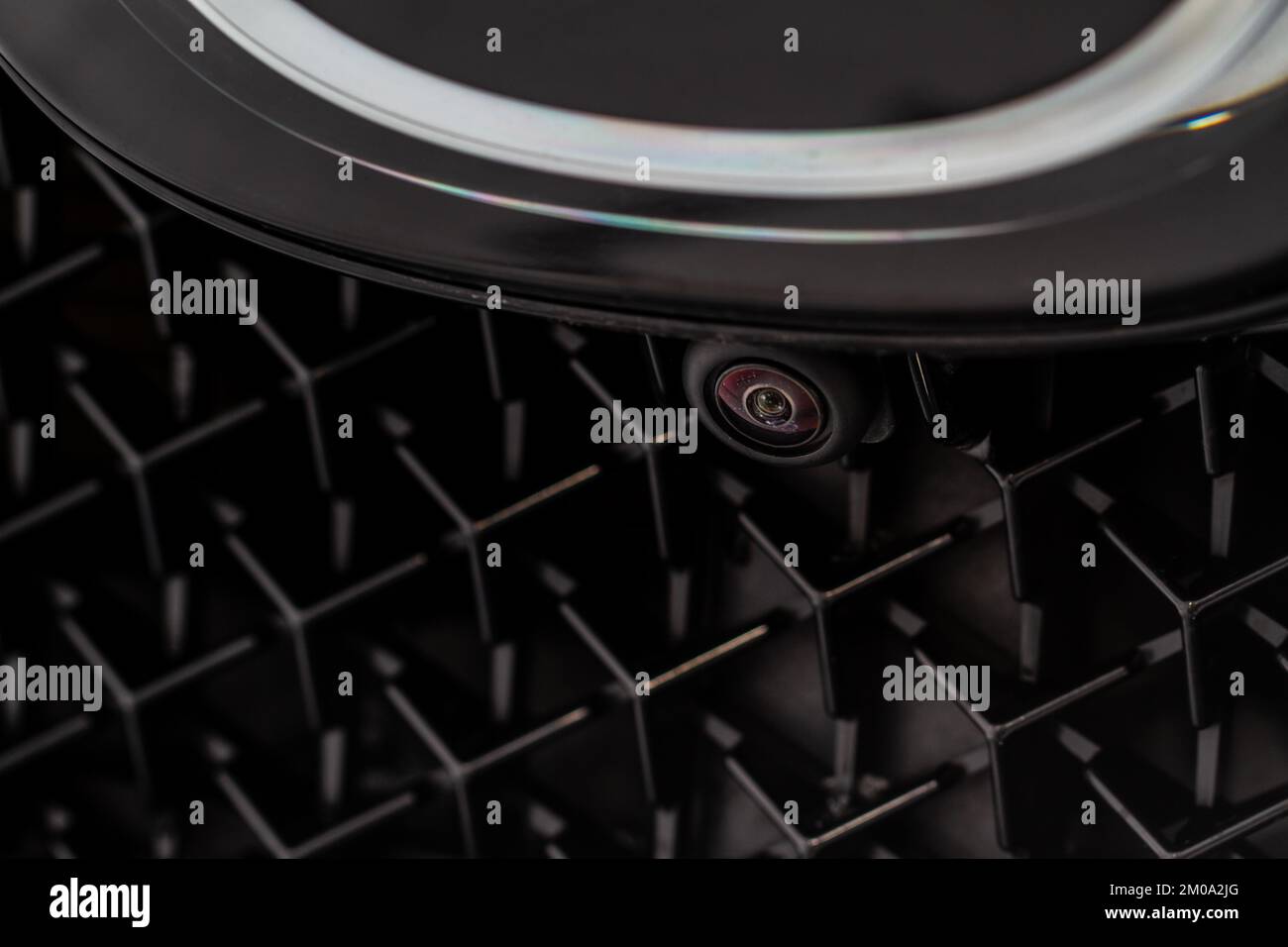 Close up view of front parking assist video camera on the car. Front ...