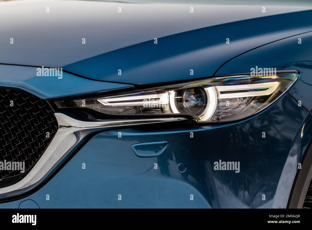 Headlight lamp of new cars. Close up detail on one of the LED ...