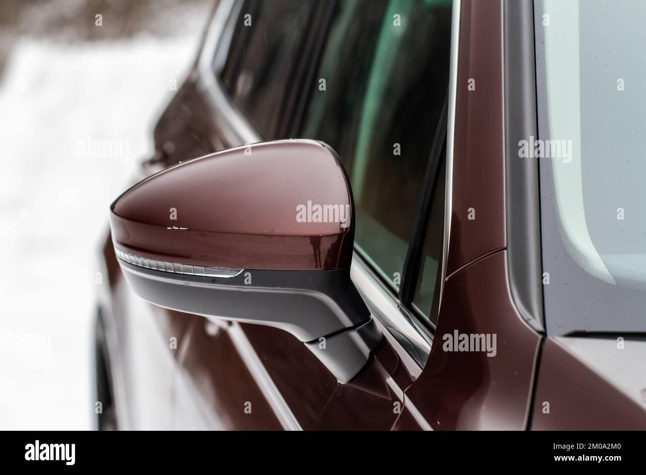 Close up front view of car side mirror. Front rear view mirror on the ...