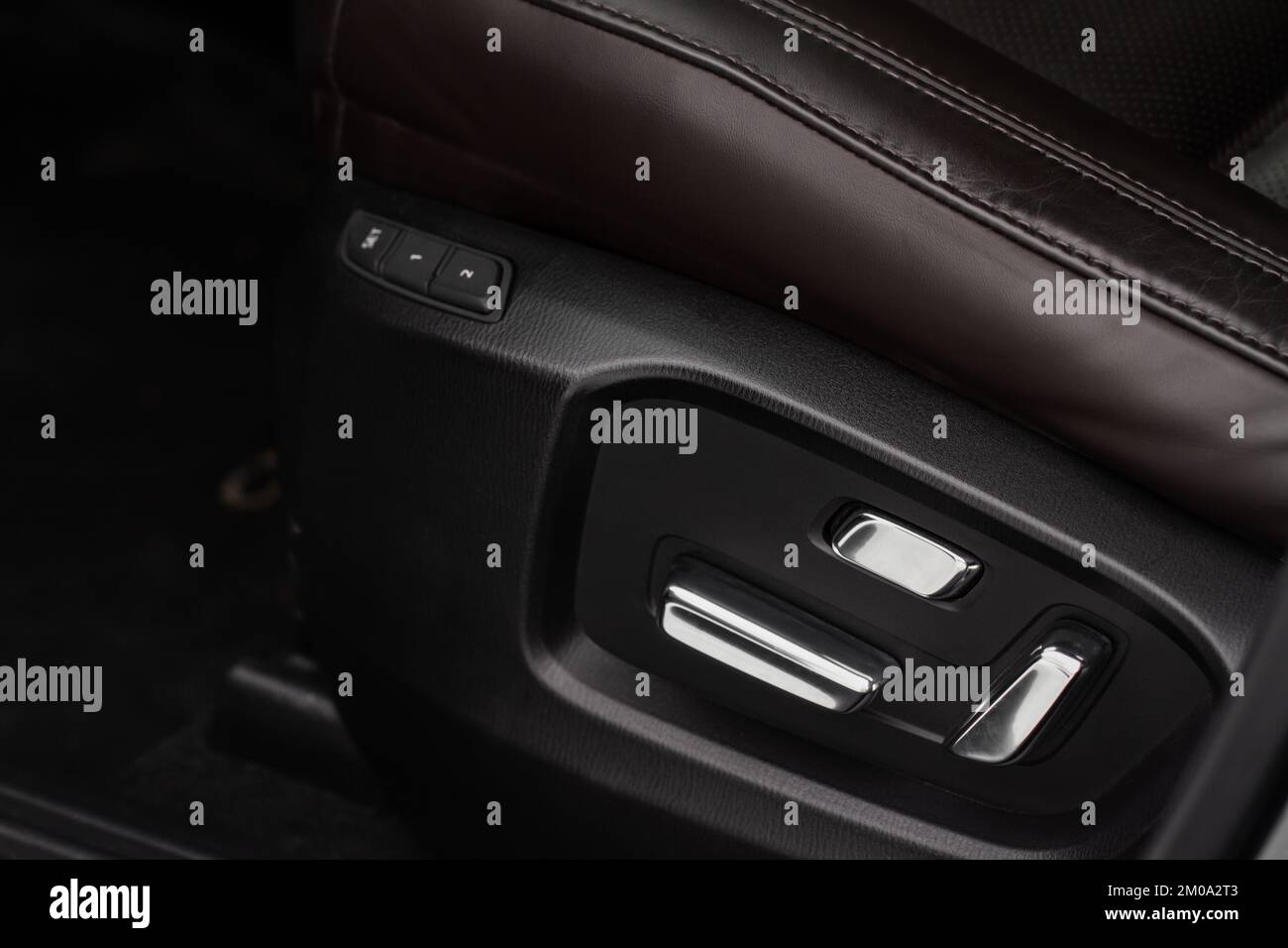 Electric car seat adjustment control panel close up view. Adjustable ...