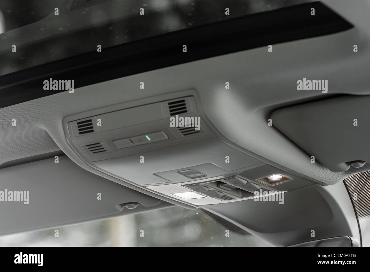 Close up image of the SOS button and car ceiling lamp in a car Stock ...