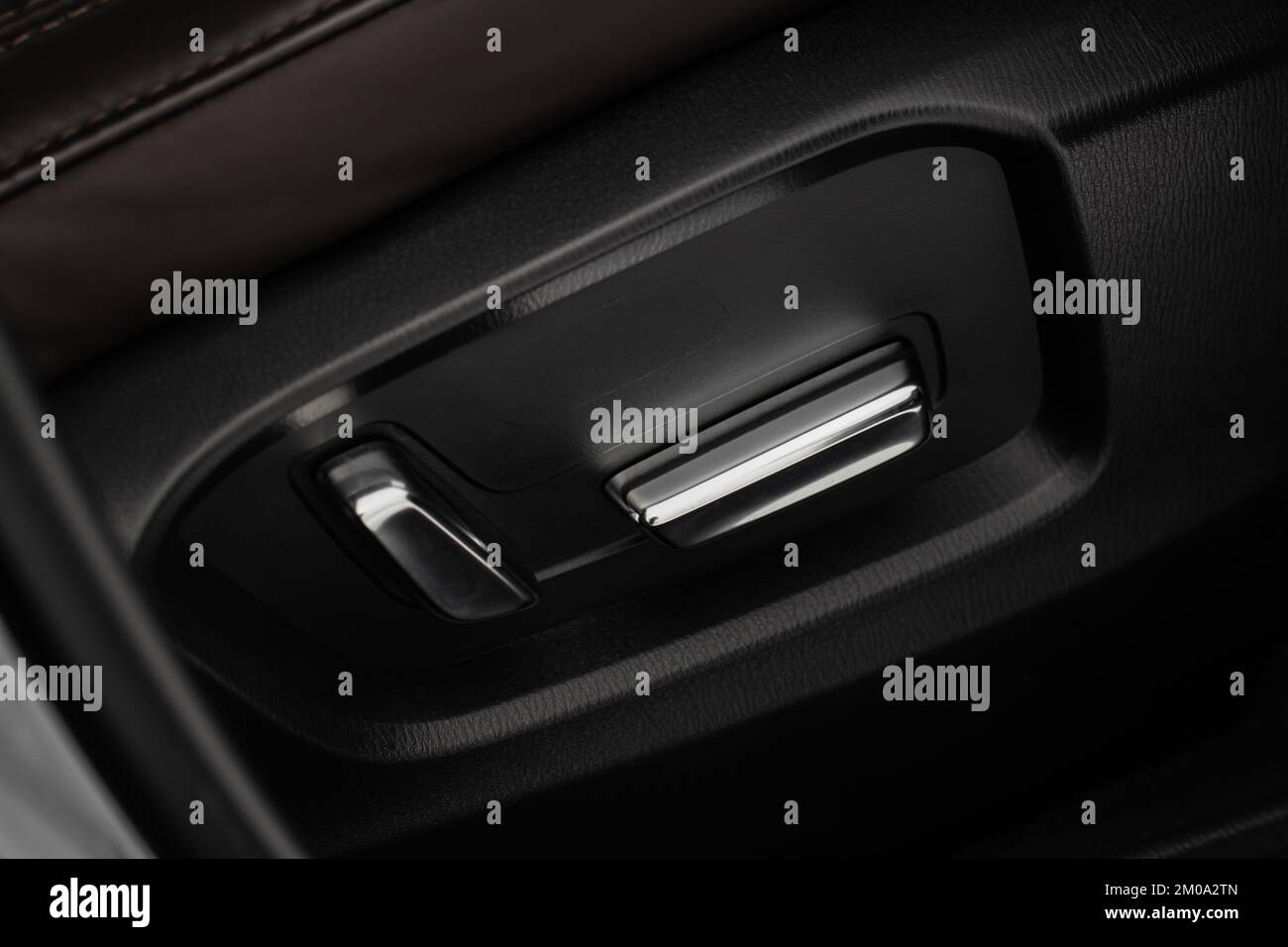 Electric car seat adjustment control panel close up view. Adjustable ...