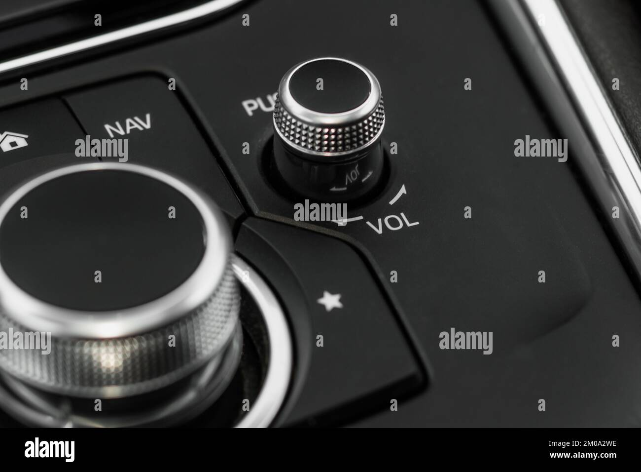 Volume control of car audio system. FM radio button in car panel Stock ...