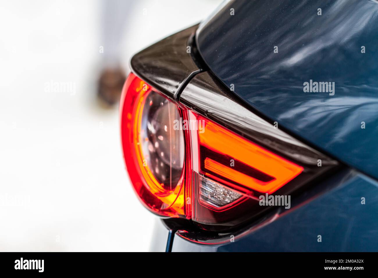 Modern rear light of a car. Brake light and arrow of large suv. Rear ...