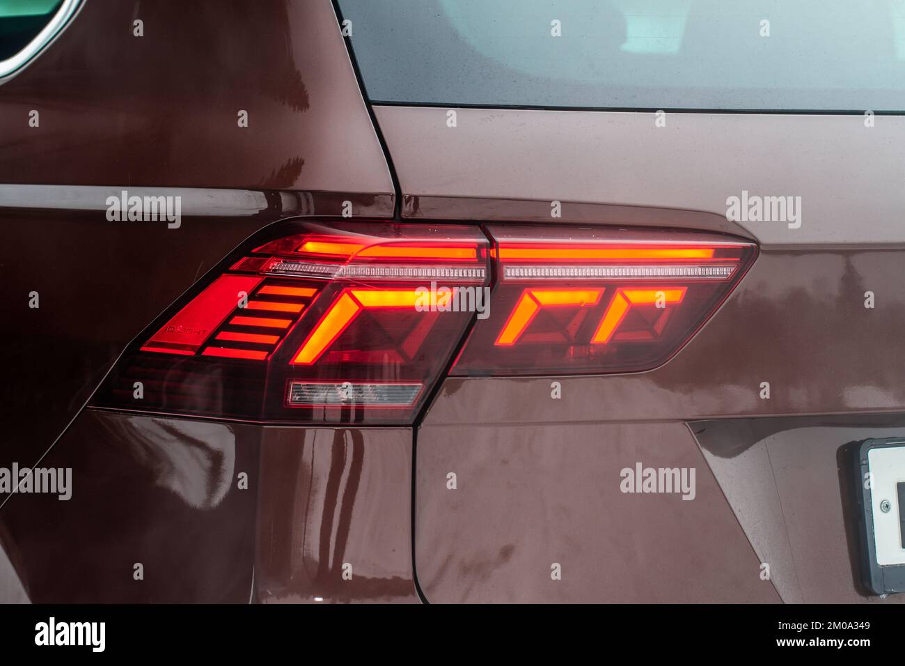 Modern rear light of a car. Brake light and arrow of large suv. Rear ...