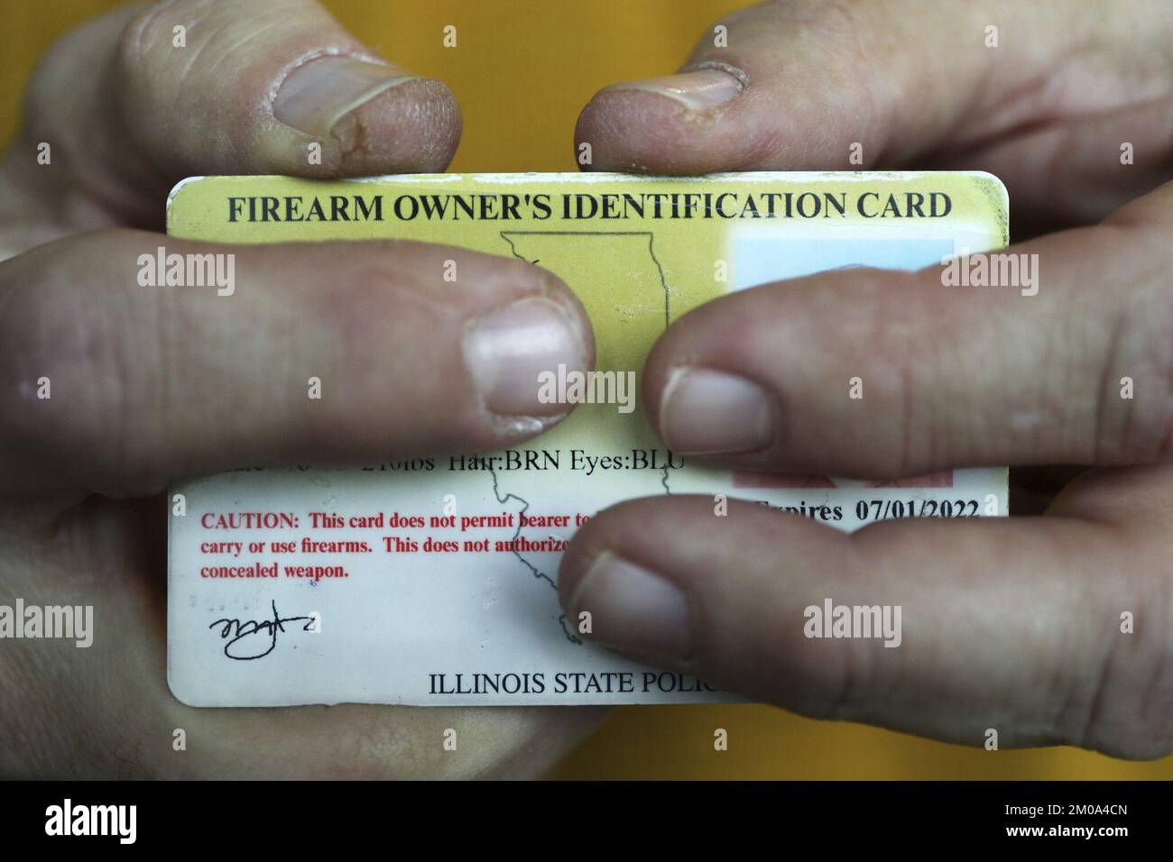 Mark Jones, a gun safety advocate, and retired ATF agent, displays his ...