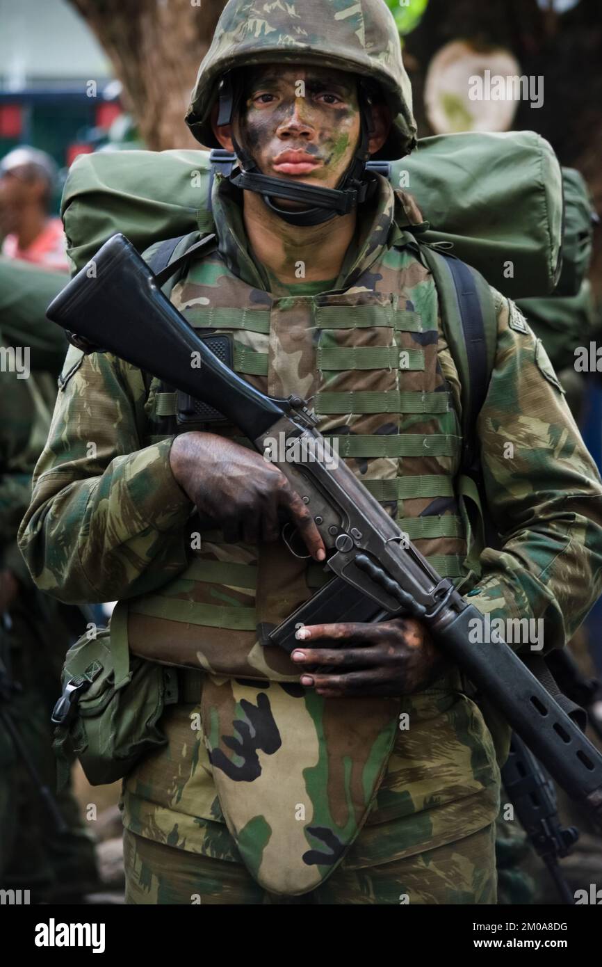 A soldier holding a rifle at a military parade in celebration of Brazil ...