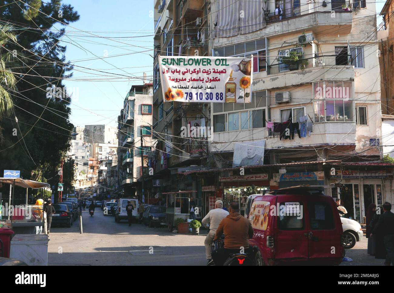 Commercial of sunflower oil in a street of Tripoli, Lebanon, December 4 ...
