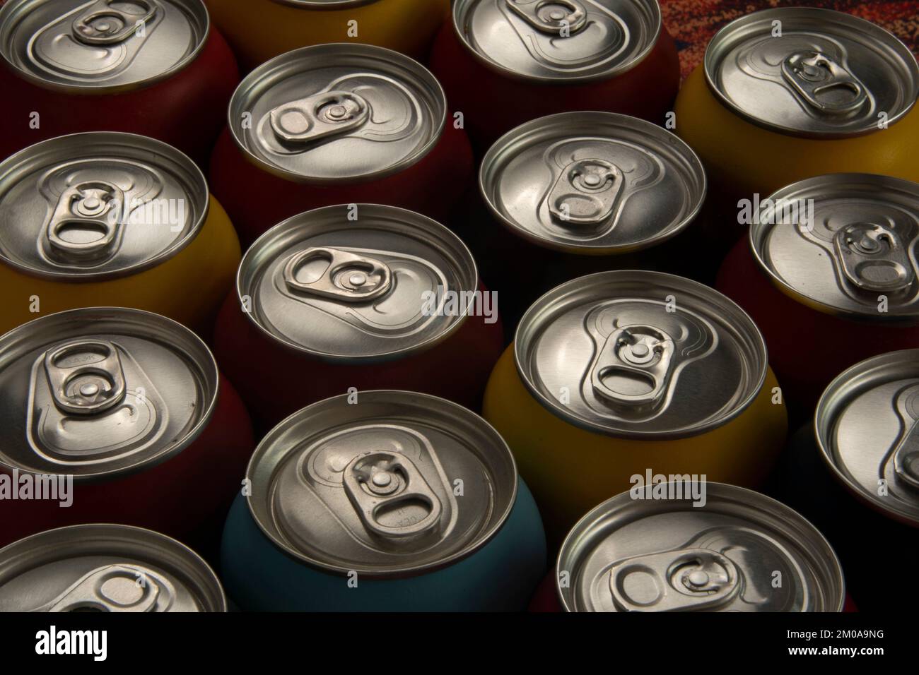 Group of aluminum soda cans of assorted colors forming a mosaic Stock ...