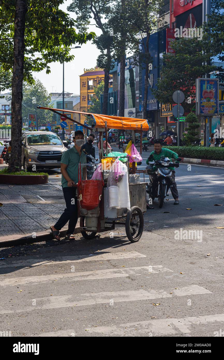 Ho Chi Minh City, Vietnam - November 10, 2022: Street food seller on ...