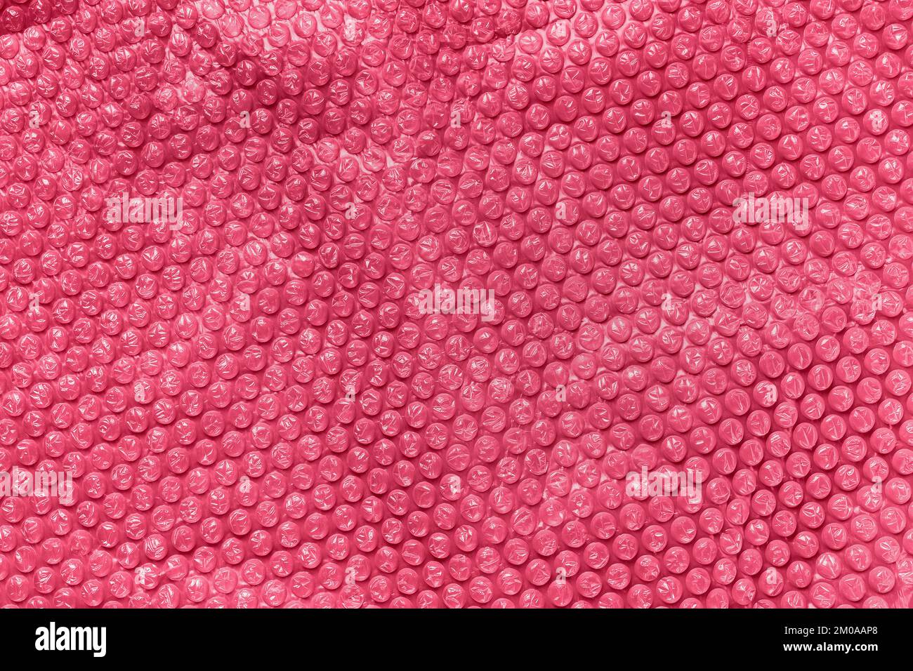 Color of the year 2023 Viva Magenta. Clear bubble foil for wrapping ...