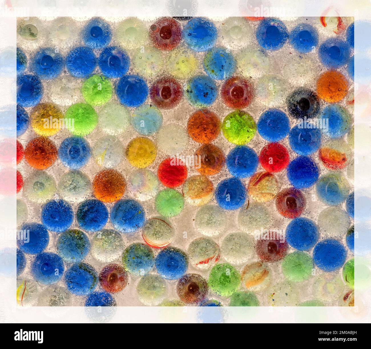 A photo project using backlit marbles reveals both the glass clarity ...
