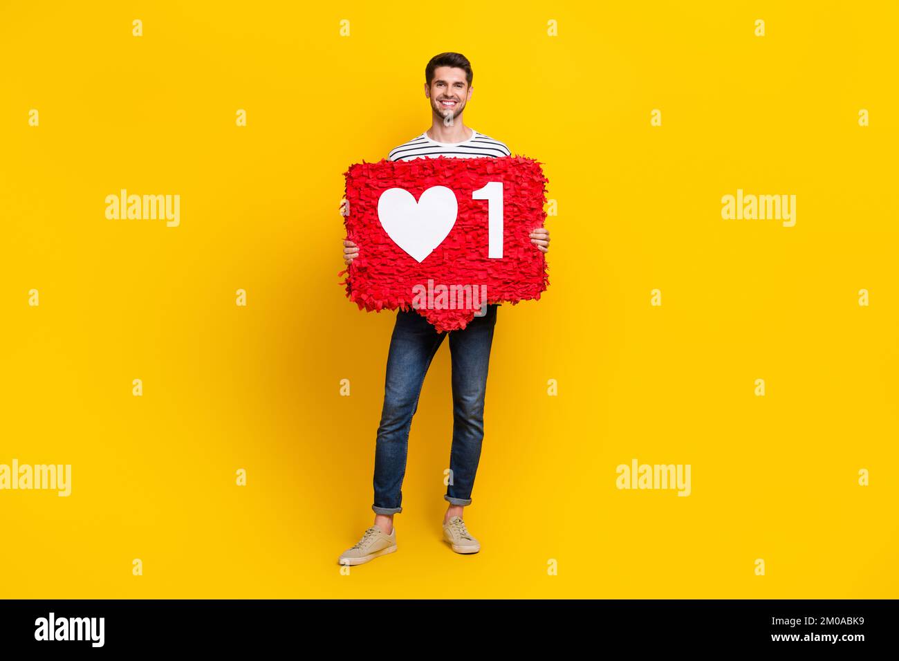 Full length photo of cheerful positive guy dressed striped t-shirt ...