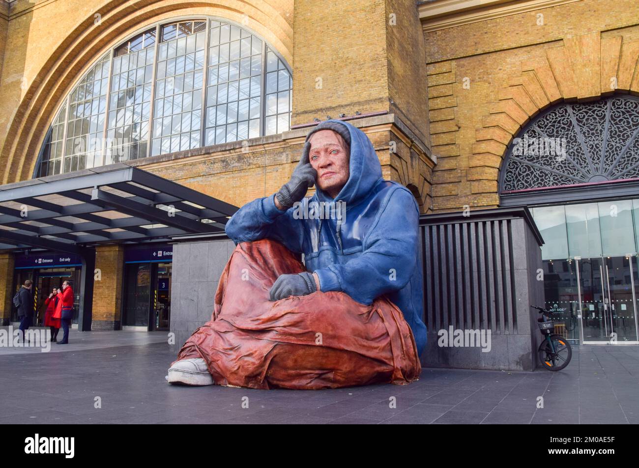 London, UK. 5th December 2022. A giant sculpture of a homeless person ...