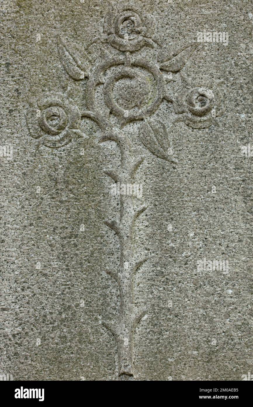 Stone carving on grave stone in cemetery Stock Photo - Alamy