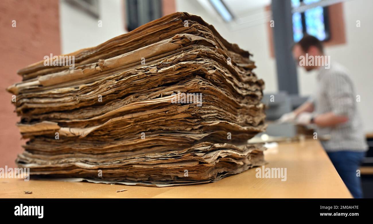 05 December 2022, Thuringia, Mühlhausen: Benjamin Graf-Schwarzburg, archivist at the Mühlhausen ...