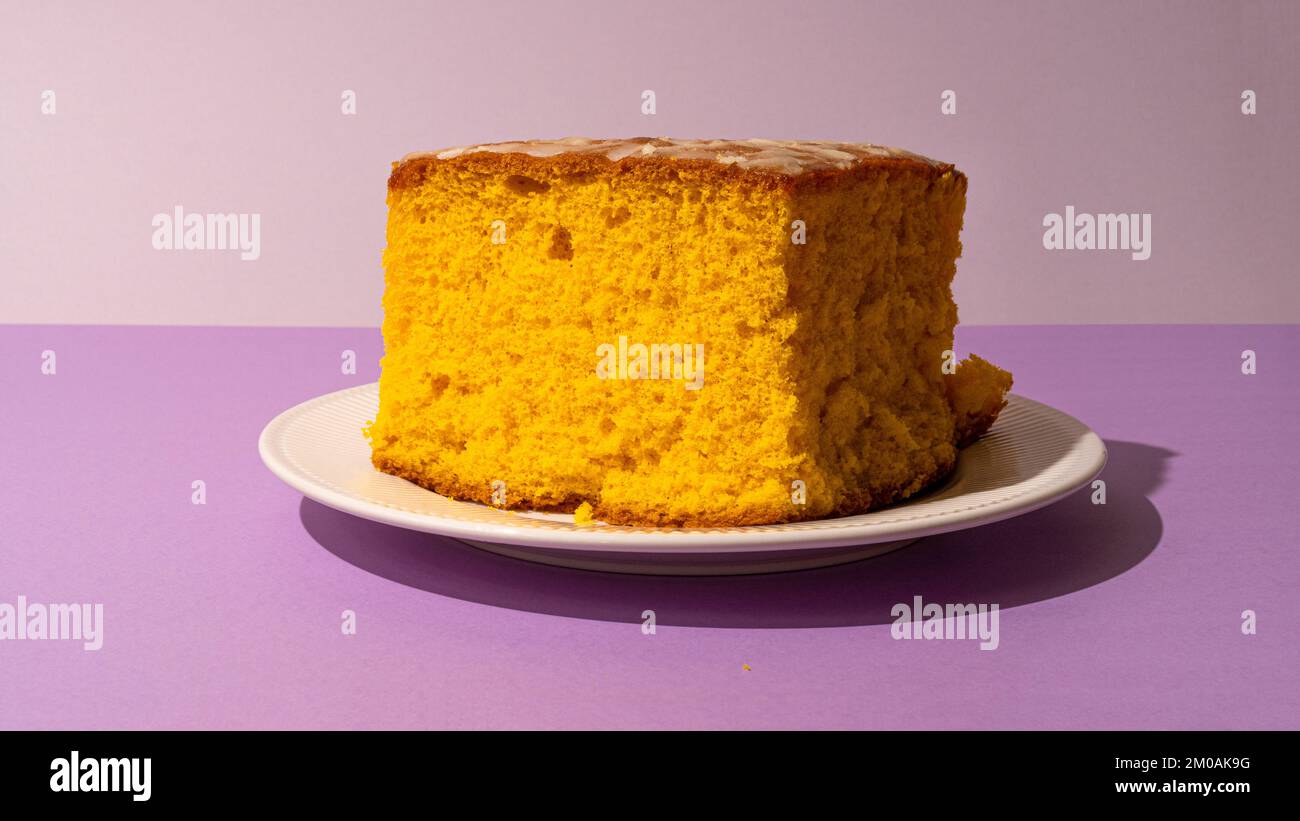 Pao de Lo - typical cake of Portugal on purple background Stock Photo ...