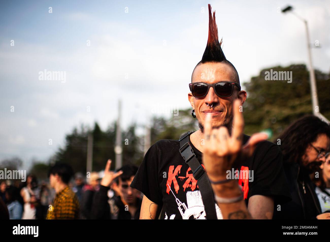 Concertgoers pose for a portrait during the third day of the comeback ...