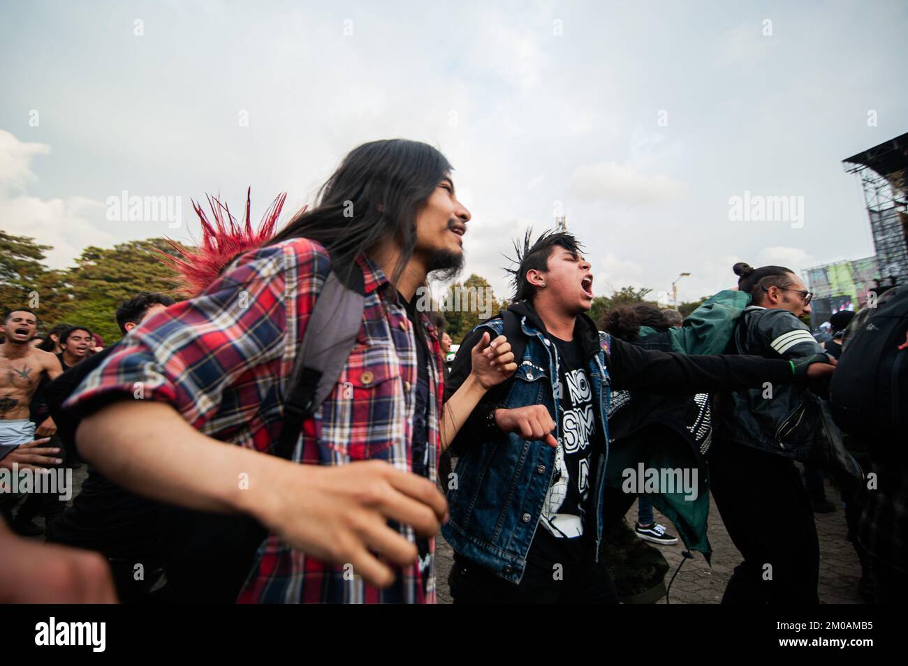 Concertgoers mosh-pit during the third day of the comeback of 'Rock al ...