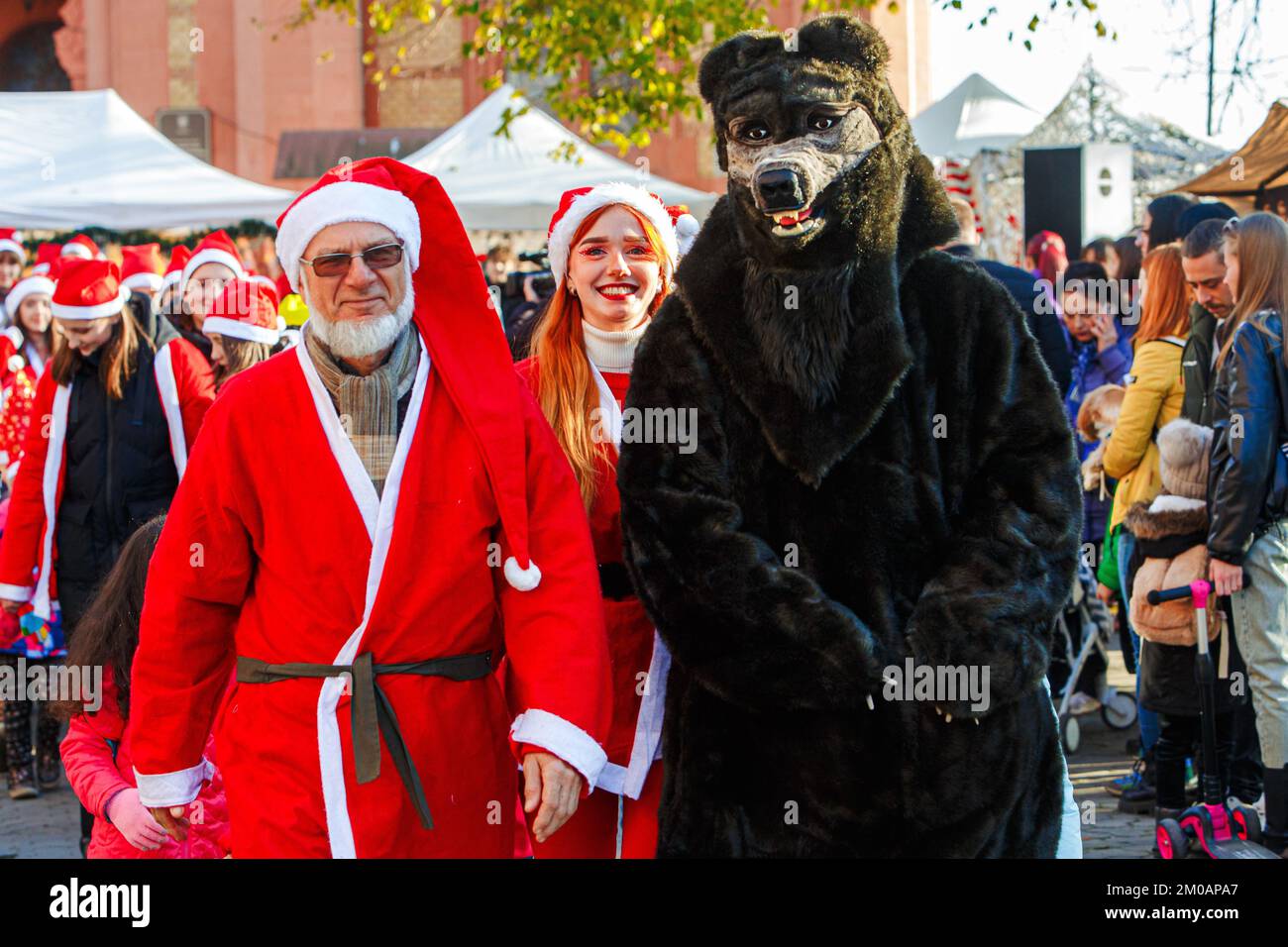 UZHHOROD, UKRAINE - DECEMBER 4, 2022 - People dressed in fancy costumes ...