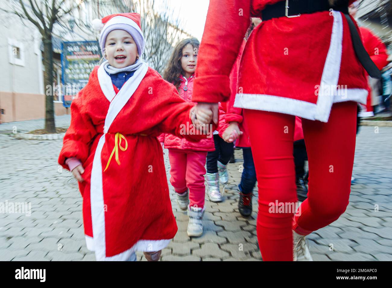 UZHHOROD, UKRAINE - DECEMBER 4, 2022 - Children dressed in New Year ...