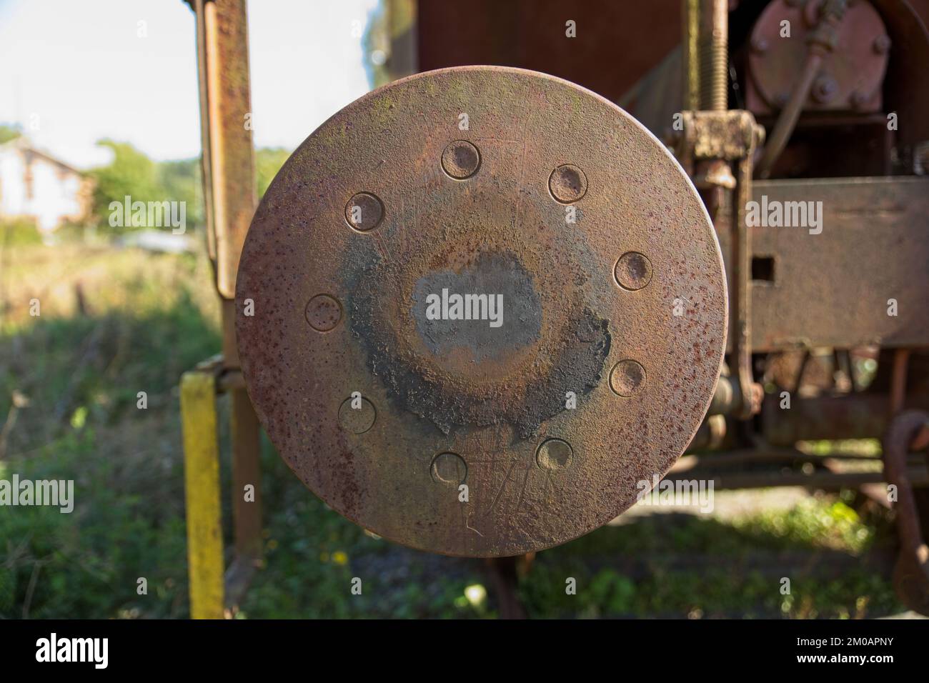 Closeup of old, weathered and rusty train bumper from the front side ...