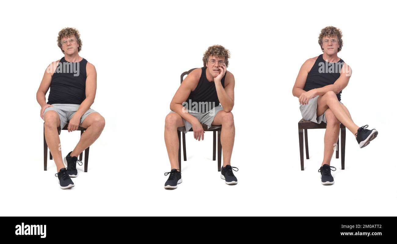 front view of same man with sportswear sitting on chair on white ...