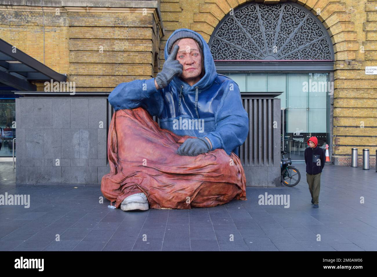 London, UK. 5th December 2022. A giant sculpture of a homeless person ...