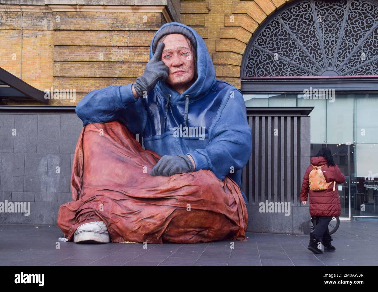 London, UK. 5th December 2022. A giant sculpture of a homeless person ...