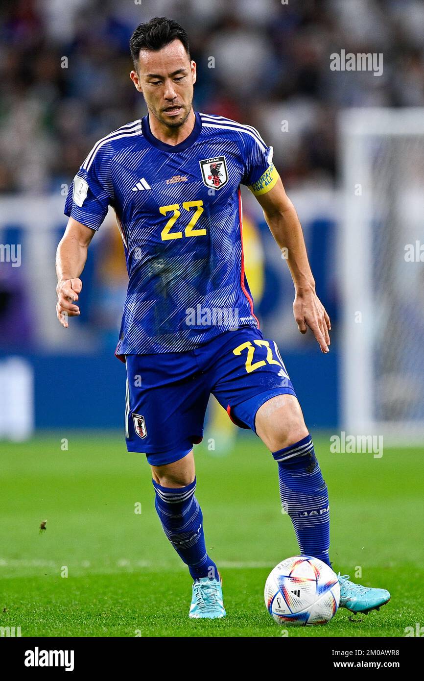 AL WAKRAH, QATAR - DECEMBER 5: Maya Yoshida of Japan runs with the ball during the Round of 16 ...