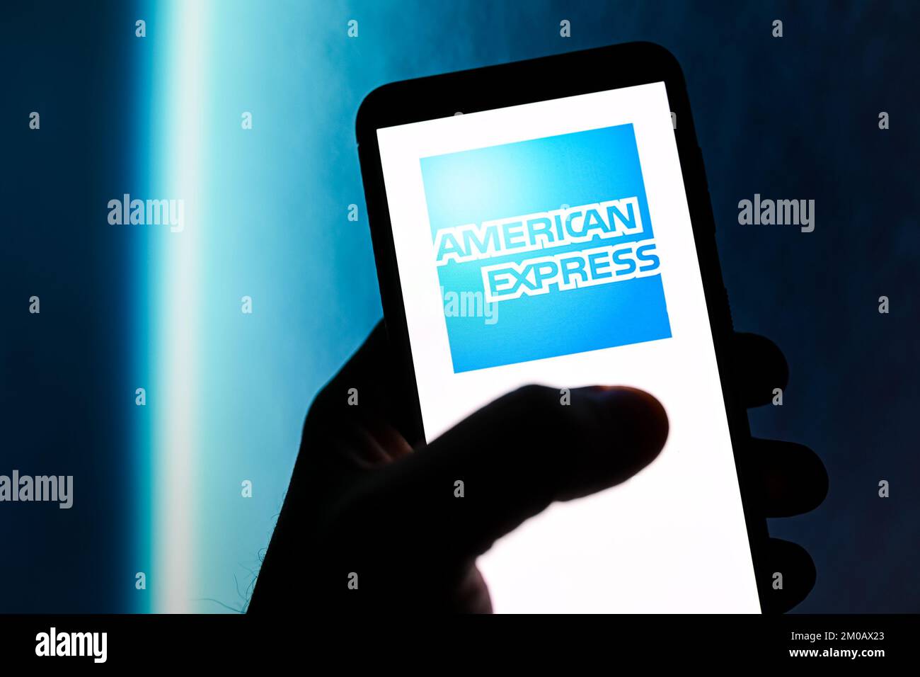 In this photo illustration an American Express logo seen displayed on a ...