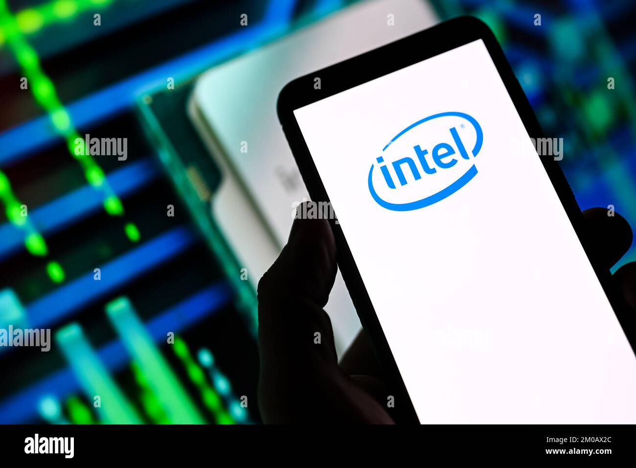 In this photo illustration an Intel logo seen displayed on a smartphone ...