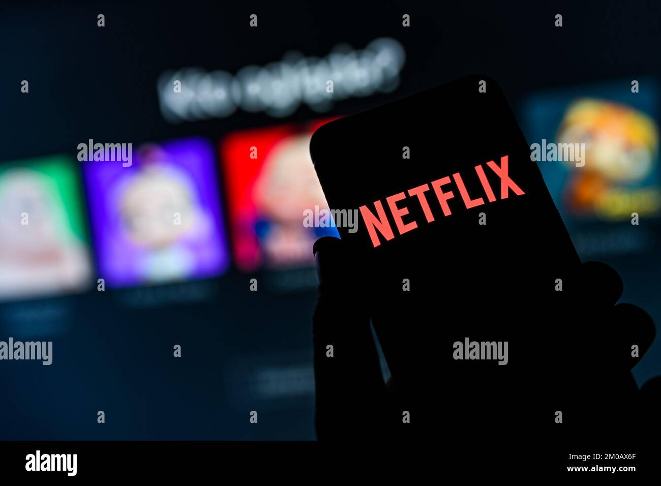 In this photo illustration a Netflix logo seen displayed on a ...