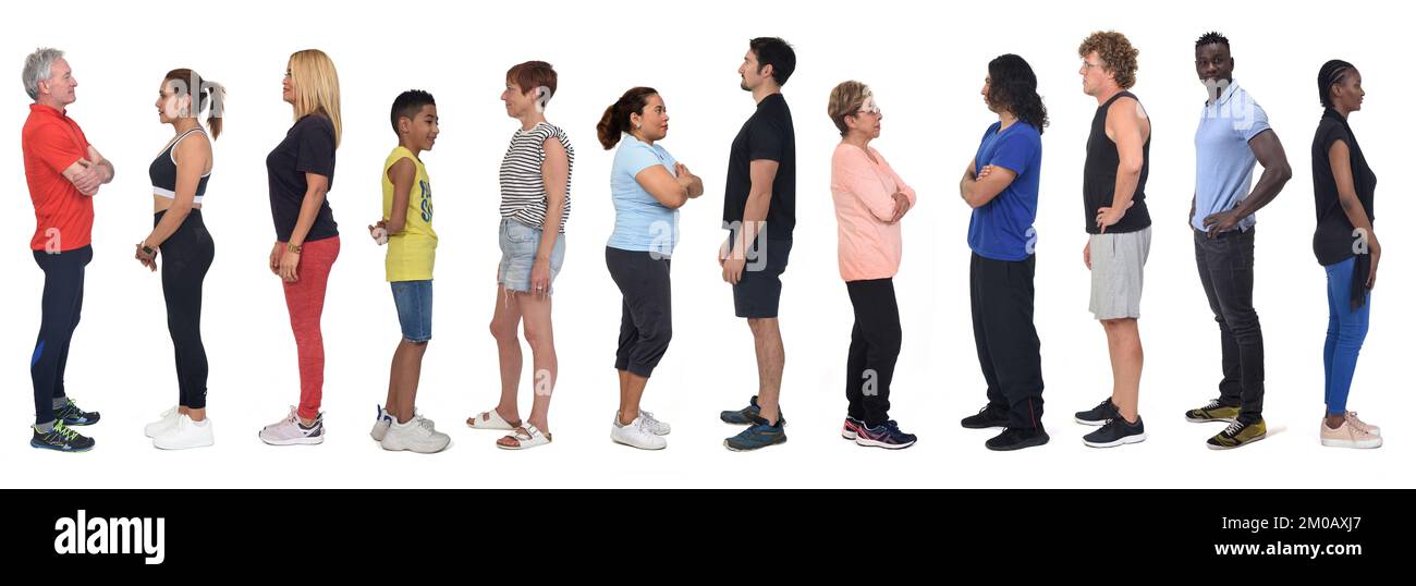 side view of a large group of people dressed in sports and casual ...